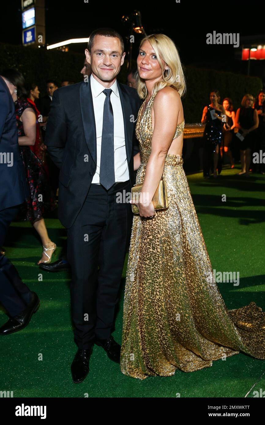 Hugh Dancy, left, and Claire Danes attend Ferrari at the 68th Primetime ...