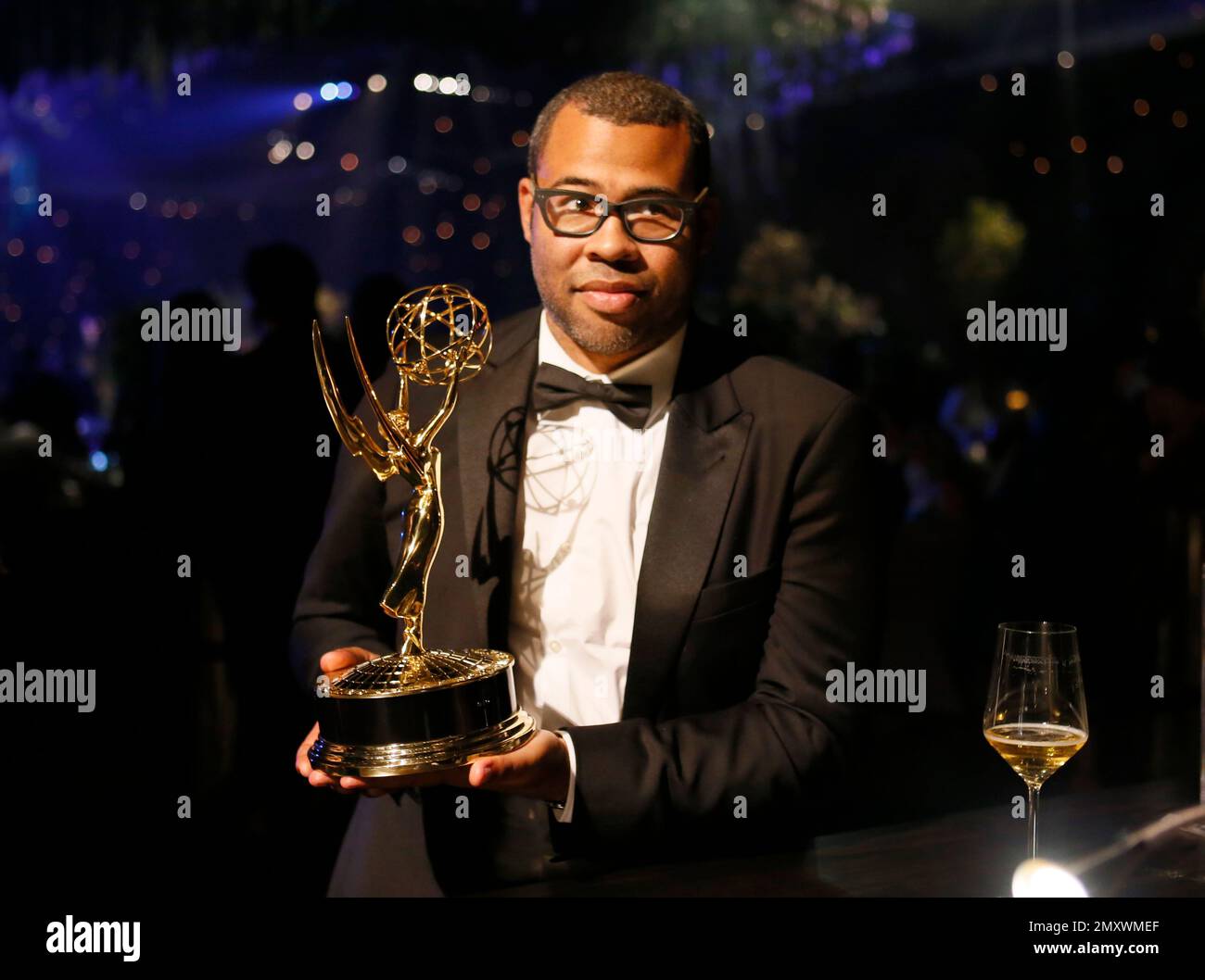 EXCLUSIVE - Jordan Peele poses with the award for outstanding variety ...