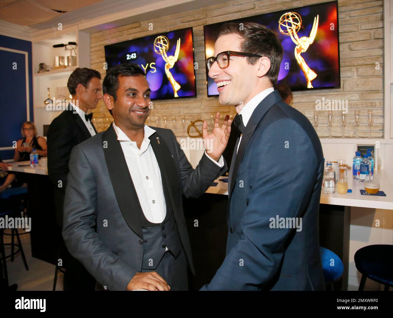 EXCLUSIVE - Aziz Ansari, left, and Andy Samberg pose backstage at the ...