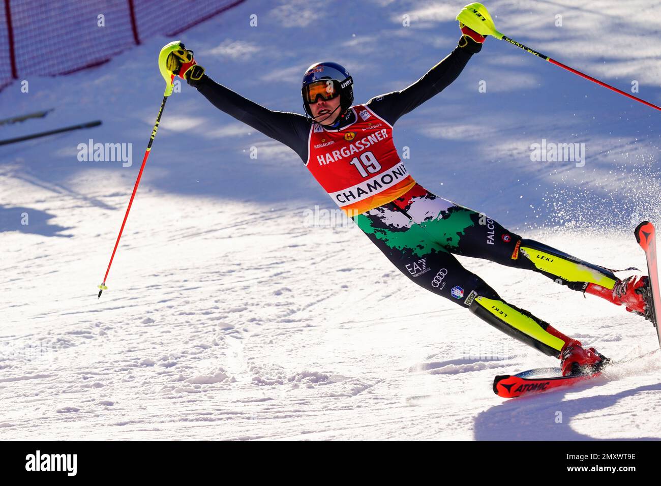Italy's Alex Vinatzer looses his balance as he arrives at the finish ...