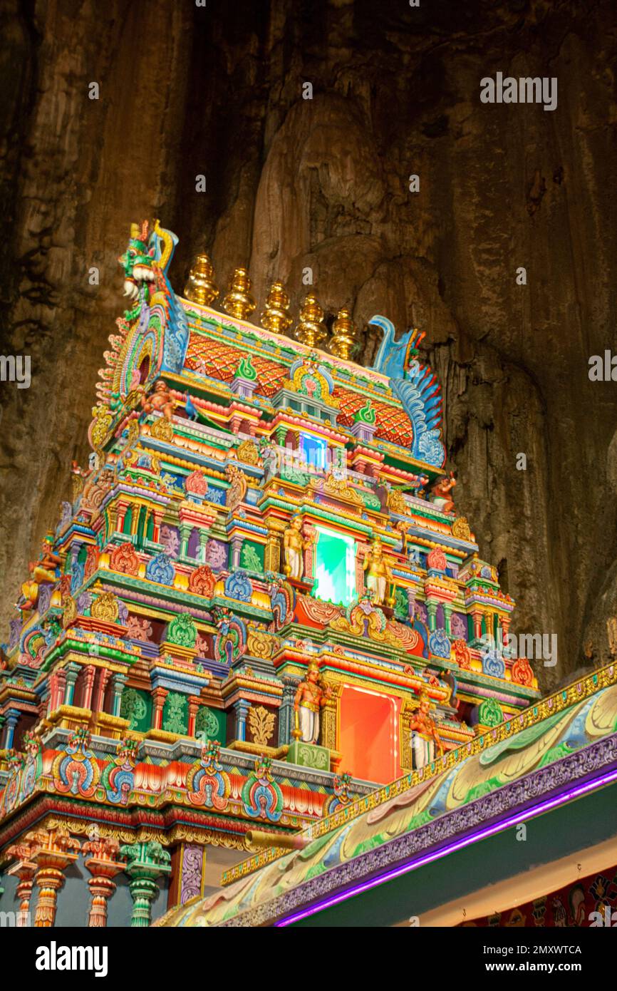 A low angle shot of colorful Hindu temple in Batu Caves in Malaysia ...