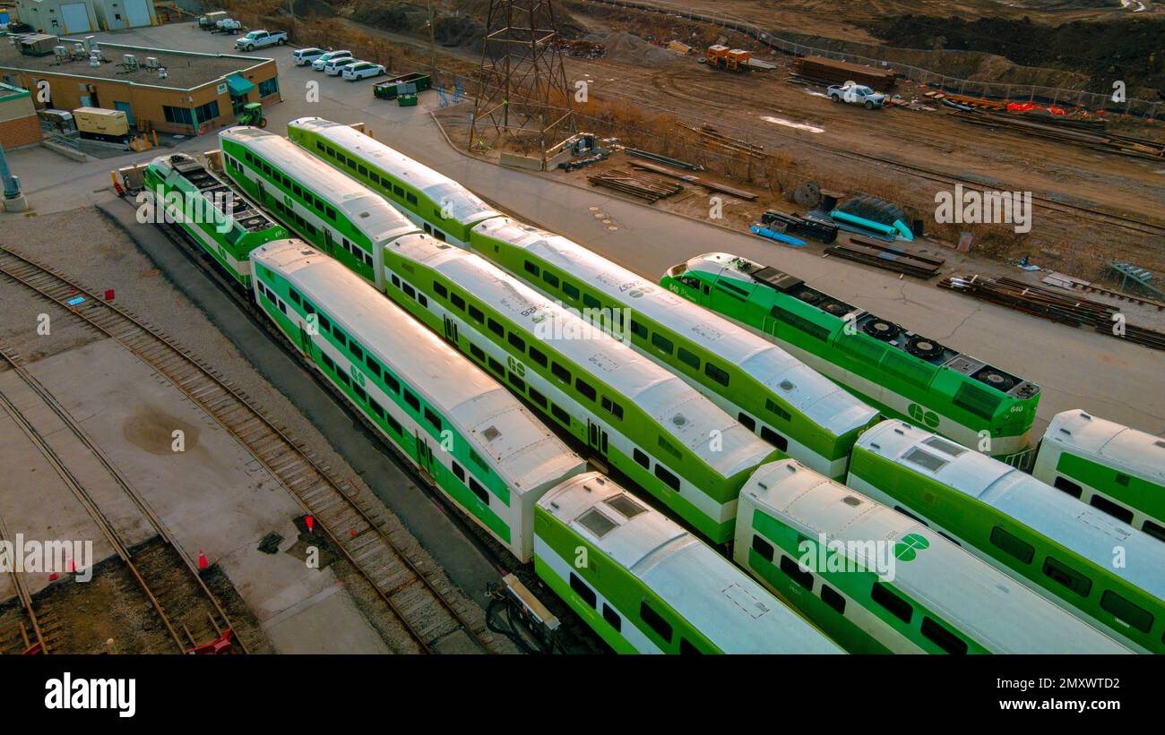 An aerial view of green trains on the railroad Stock Photo - Alamy