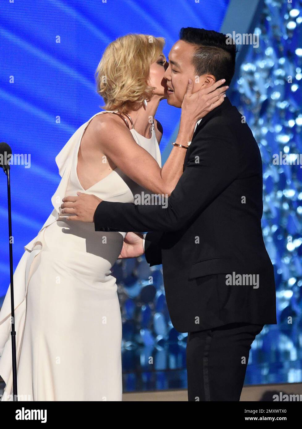 Julie Bowen, left, appears on stage with Kelvin Yu at the 68th ...