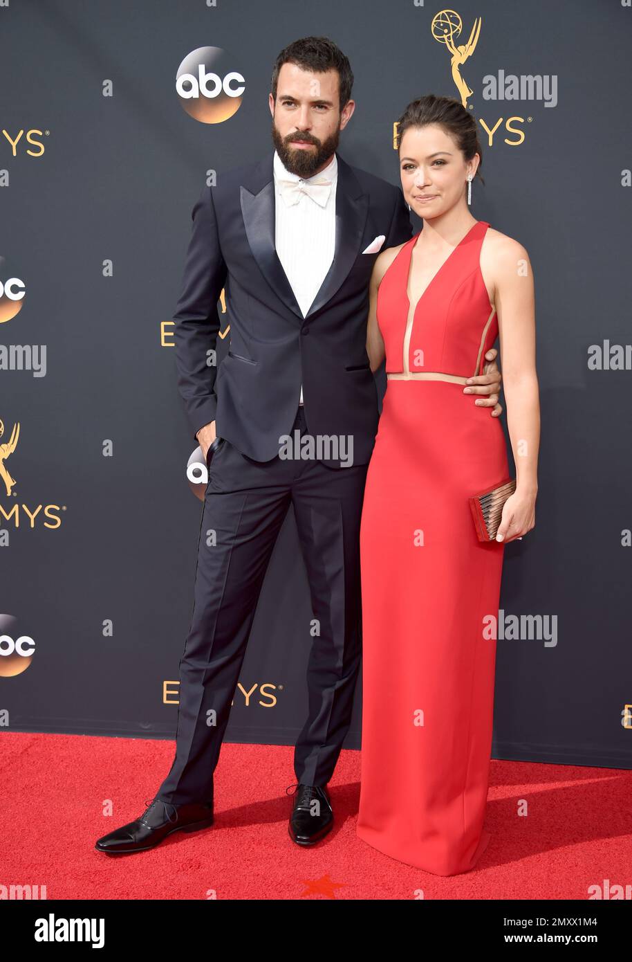 Tom Cullen, left, and Tatiana Maslany arrive at the 68th Primetime Emmy ...