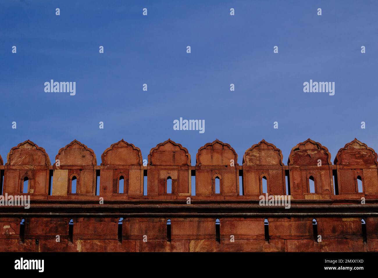 The historic Red Fort (Lal Qila) on the background of the blue sky ...