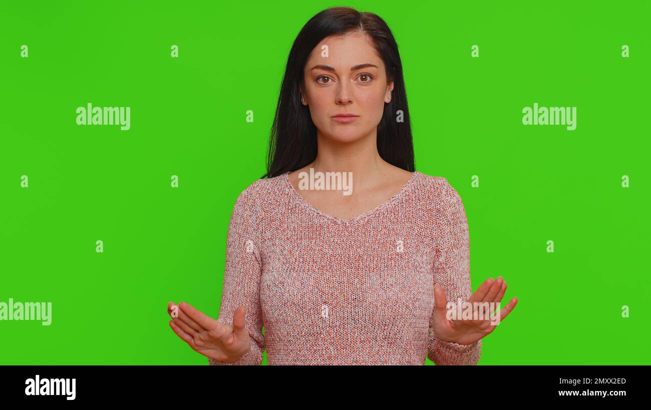 Hey you, be careful. Young woman warning with admonishing finger ...