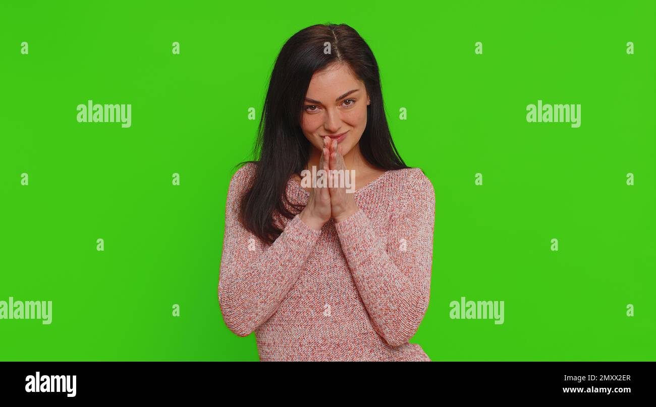 Sneaky cunning woman with tricky face gesticulating and scheming evil plan, thinking over ...