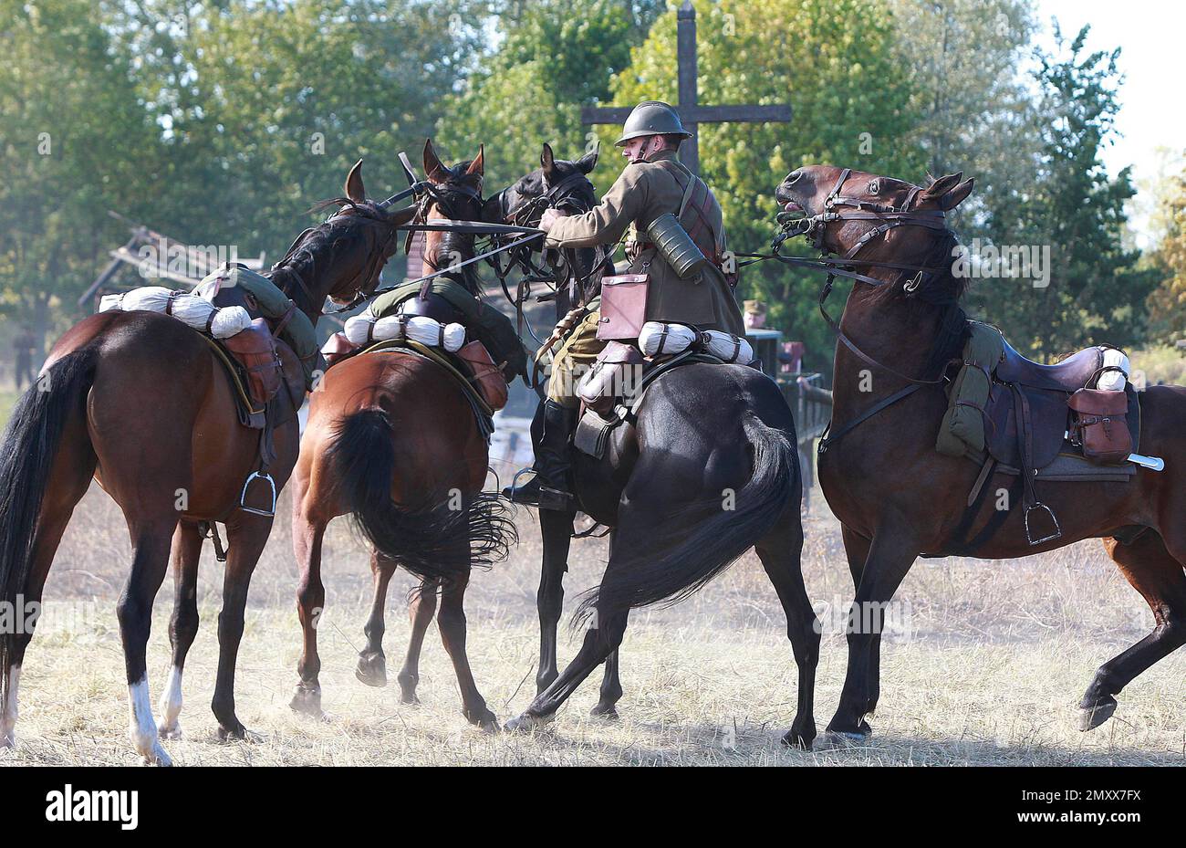 People perform during the reconstruction of the battle at the beginning ...