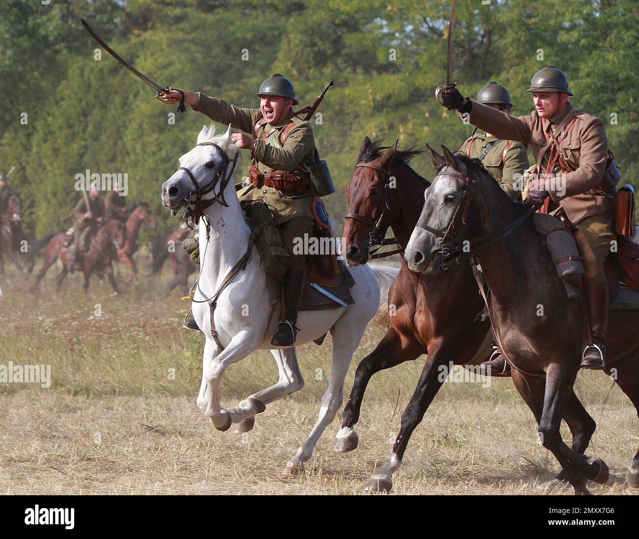 People perform during the reconstruction of the battle at the beginning ...