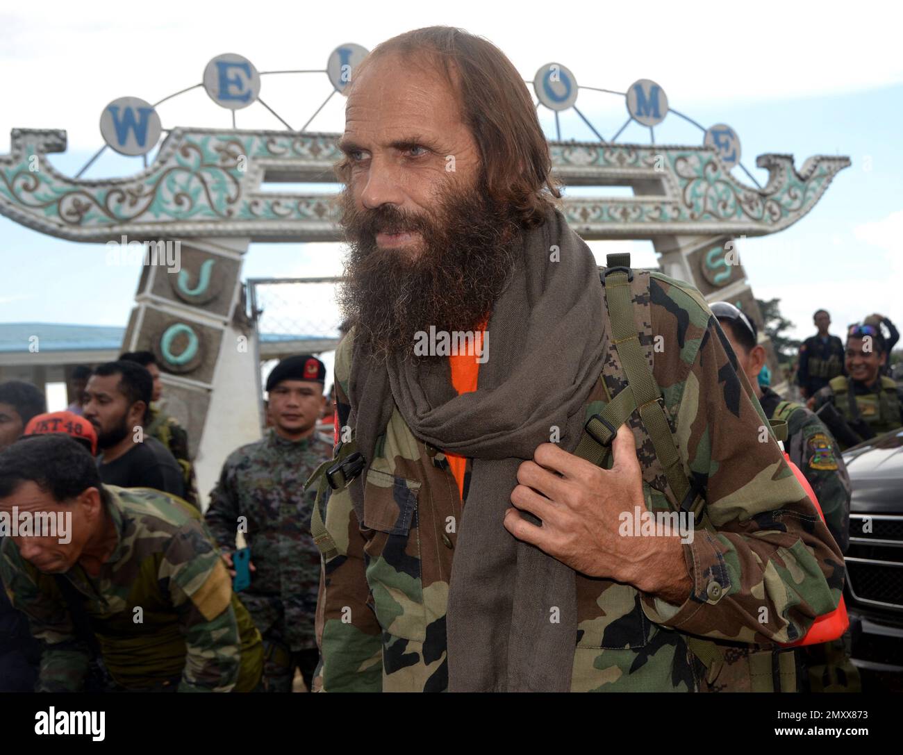 Released Norwegian hostage Kjartan Sekkingstad carries a backpack as he ...