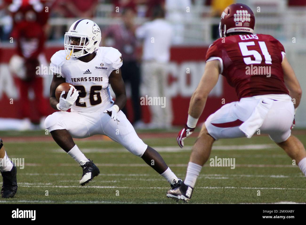 Arkansas' Brooks Ellis (51) cuts off a route for Texas State's Stedman ...