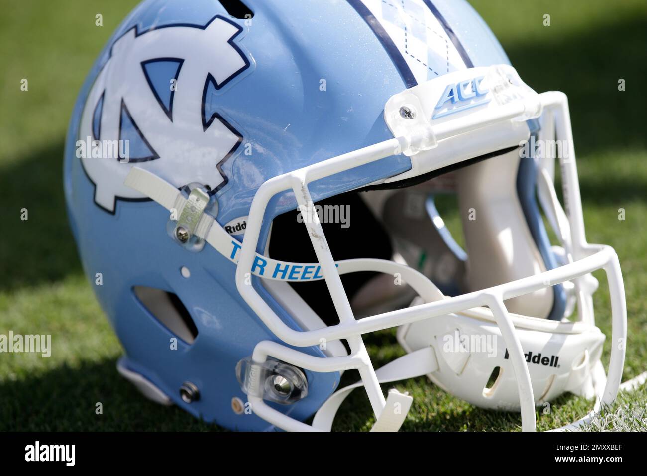 A North Carolina football helmet sits on the playing field prior to an ...