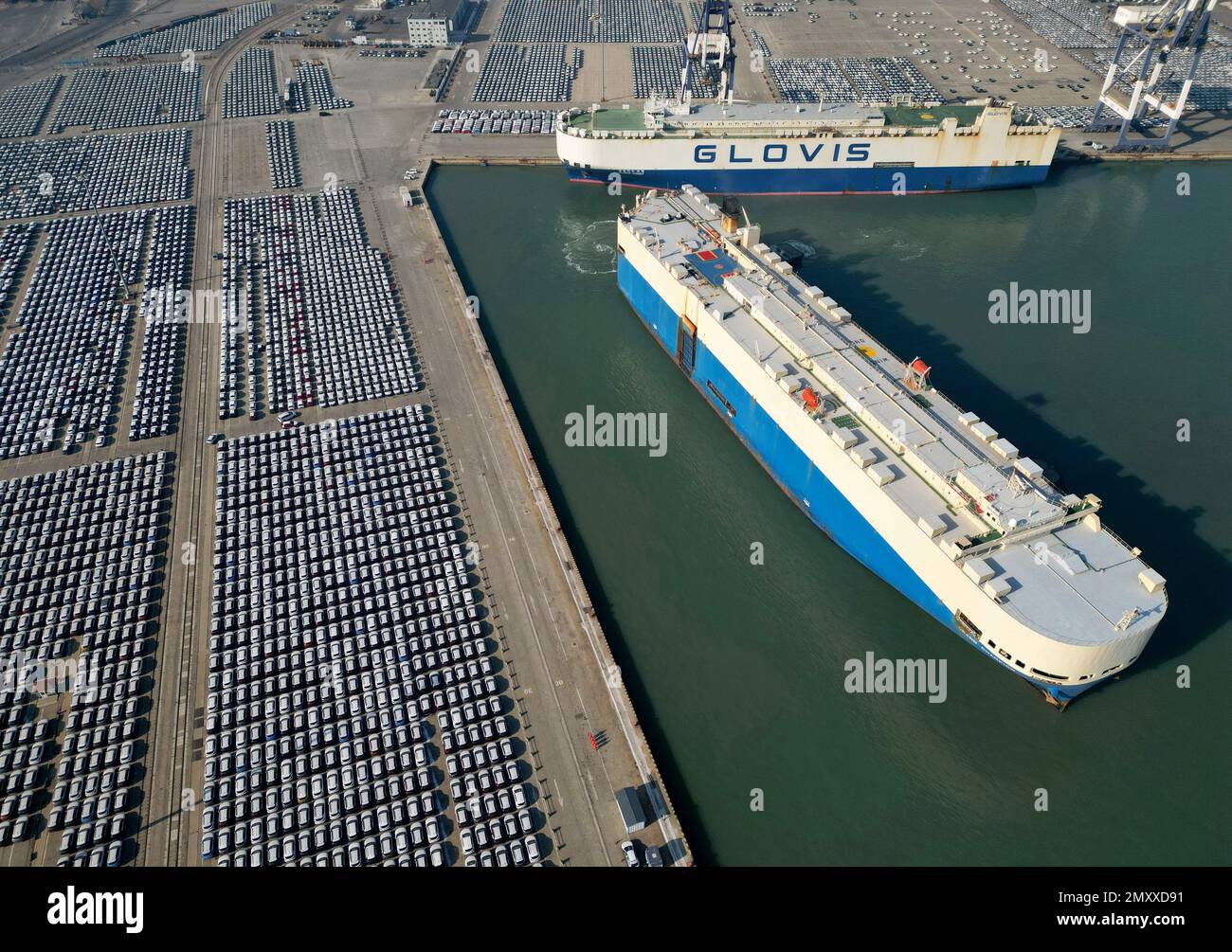 YANTAI, CHINA - FEBRUARY 4, 2023 - Vehicles are loaded onto ro-ro ships ...