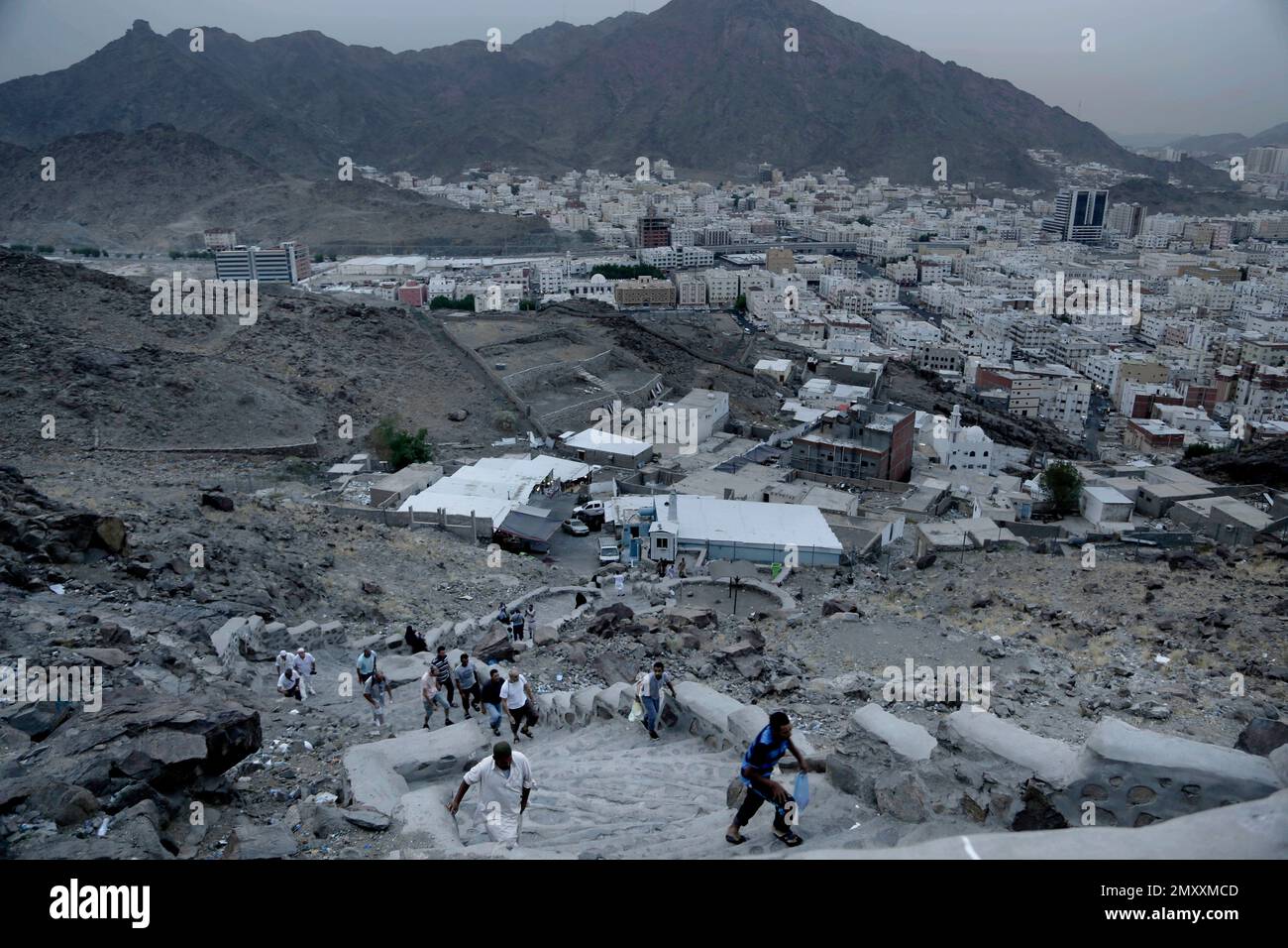 In this Friday, Sept. 9, 2016 photo, people walk up the steps of Noor ...