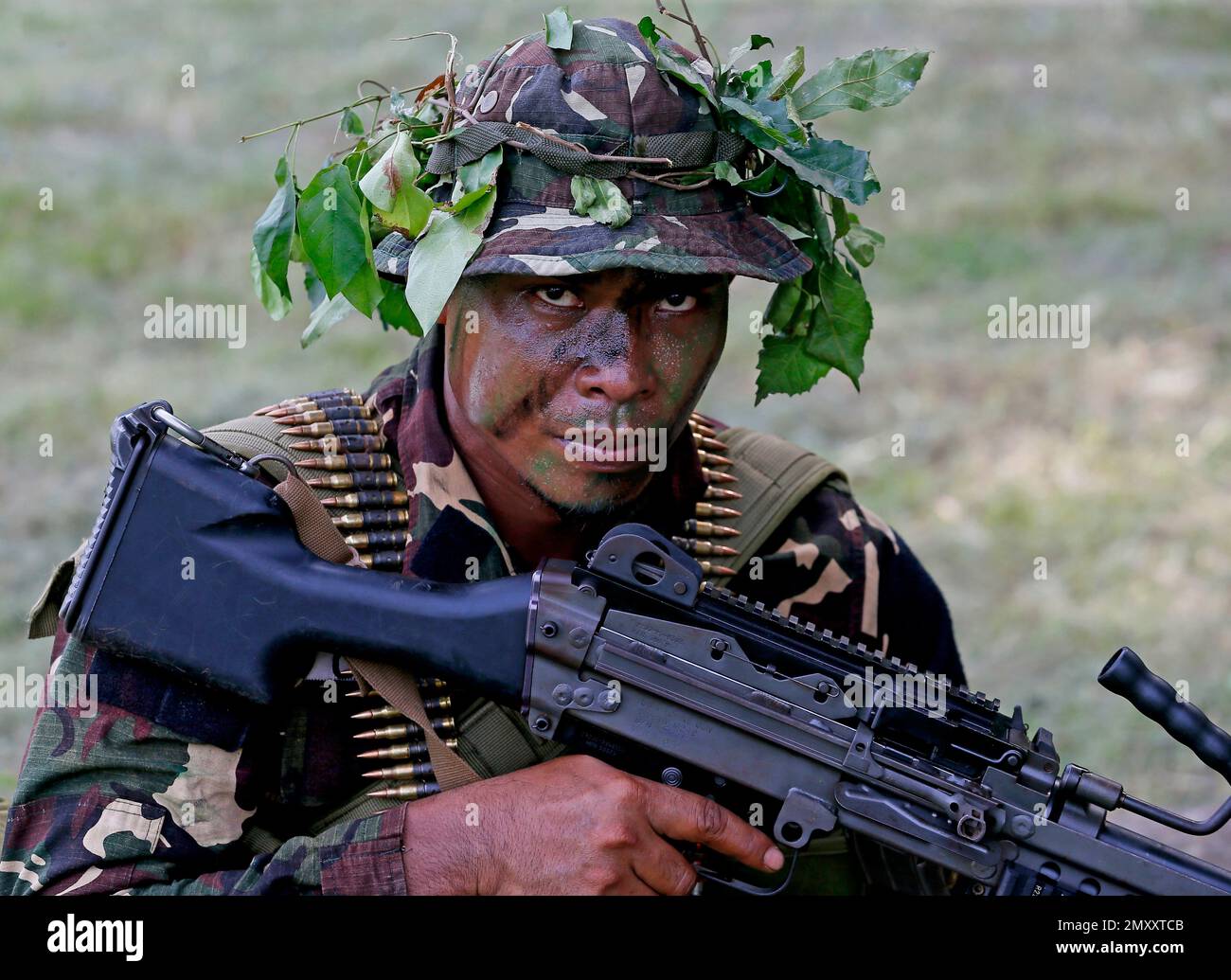 A Philippine Army Scout Ranger prepares for a drill at their ...