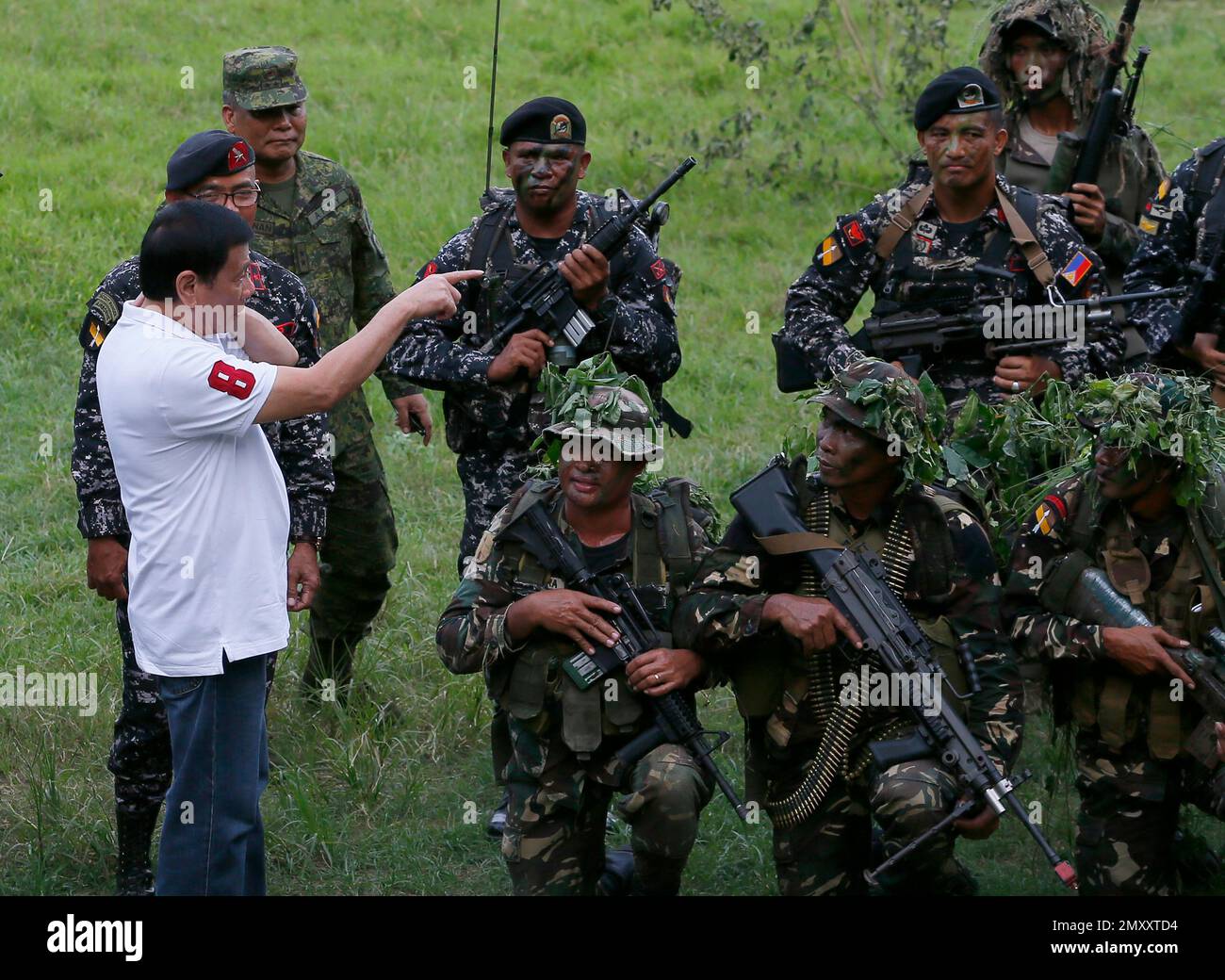 Philippine President Rodrigo Duterte talks to Philippine Army Scout ...
