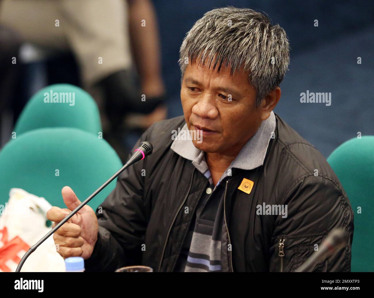 Former Filipino militiaman Edgar Matobato gestures as he testifies ...
