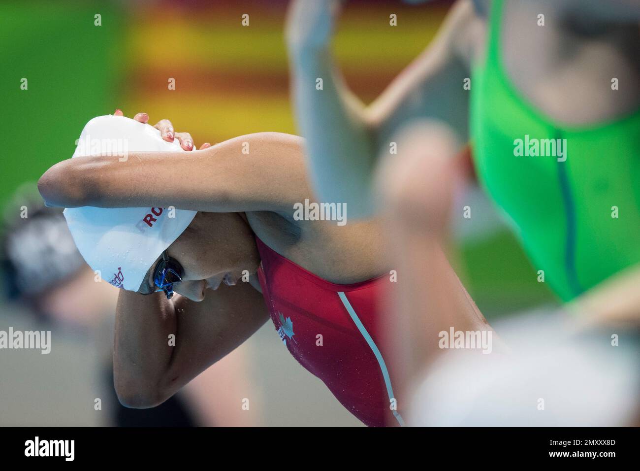 Canada's Katarina Roxon adjusts her cap before competing in the women's ...