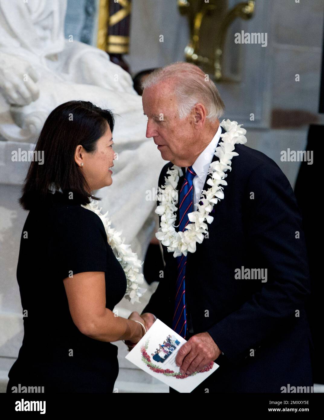 Vice President Joe Biden greets Sami Takai, wife of the late Hawaii Rep ...