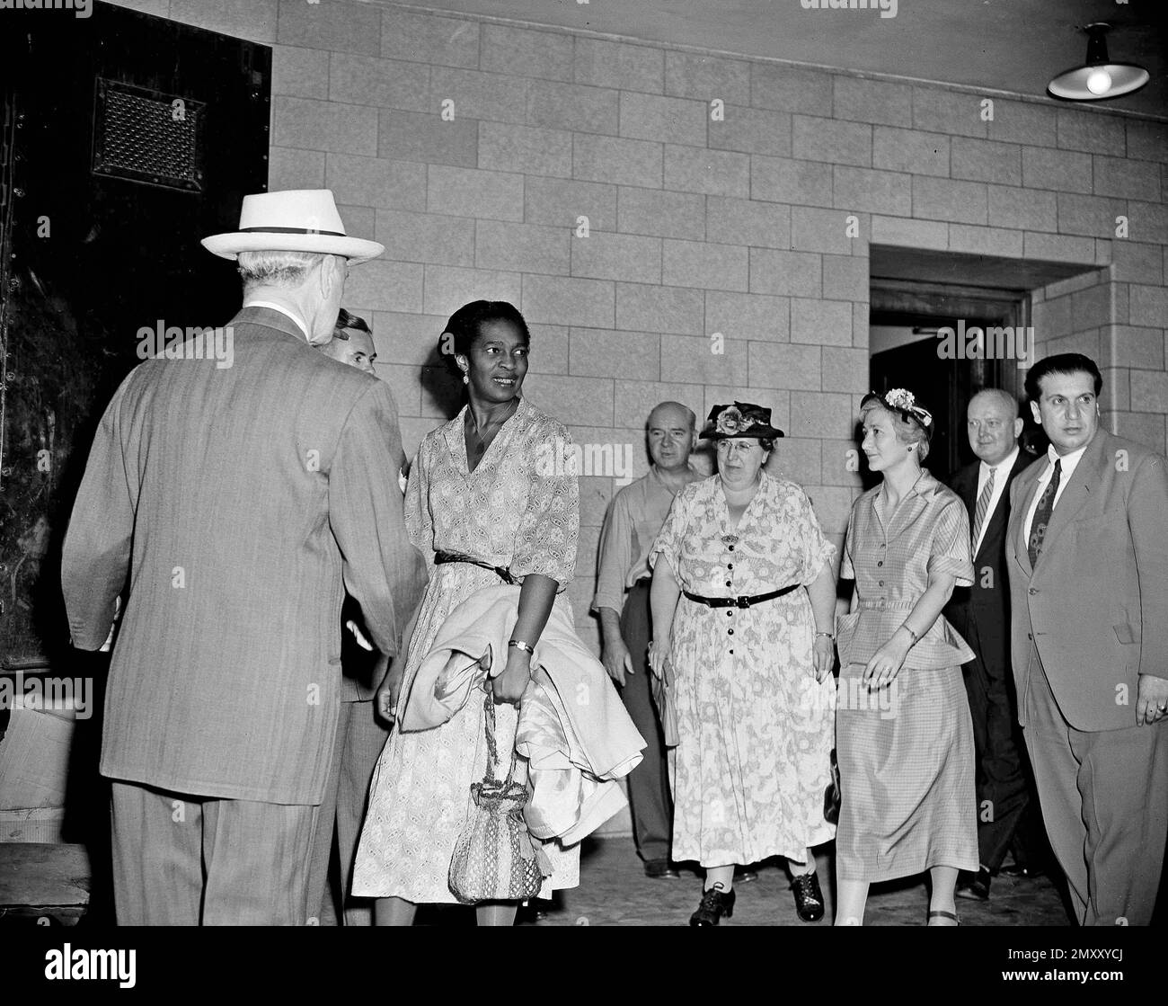 Three women in a group of 15 second-string Communists, their bail by ...