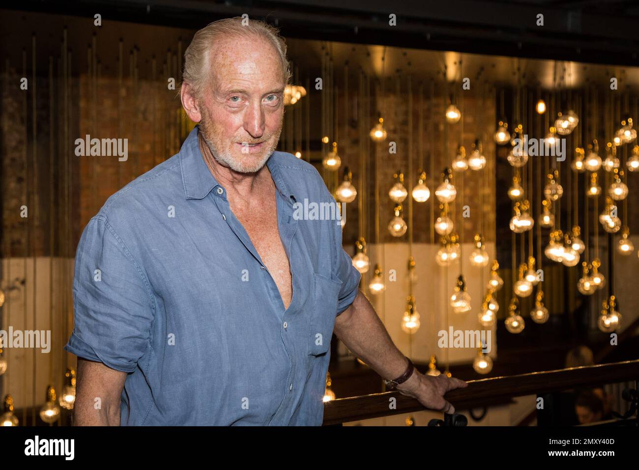 Actor Charles Dance poses for photographers upon arrival at the ...