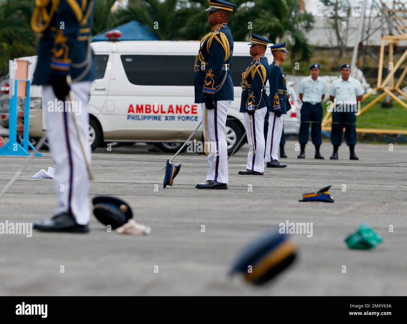 Hats are blown off, as the presidential chopper with Philippine ...