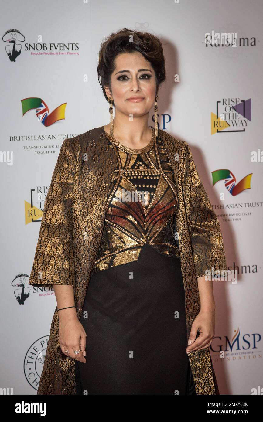 Fashion designer Raishma poses for photographers upon arrival at the ...