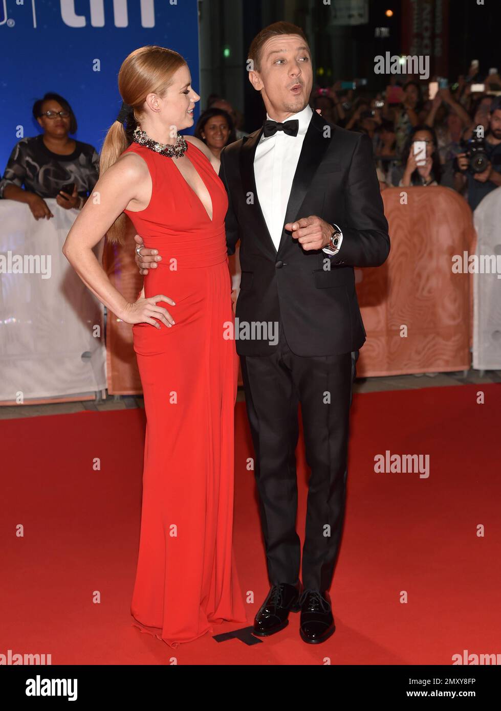 Amy Adams, left, and Jeremy Renner arrive at the "Arrival" premiere on ...