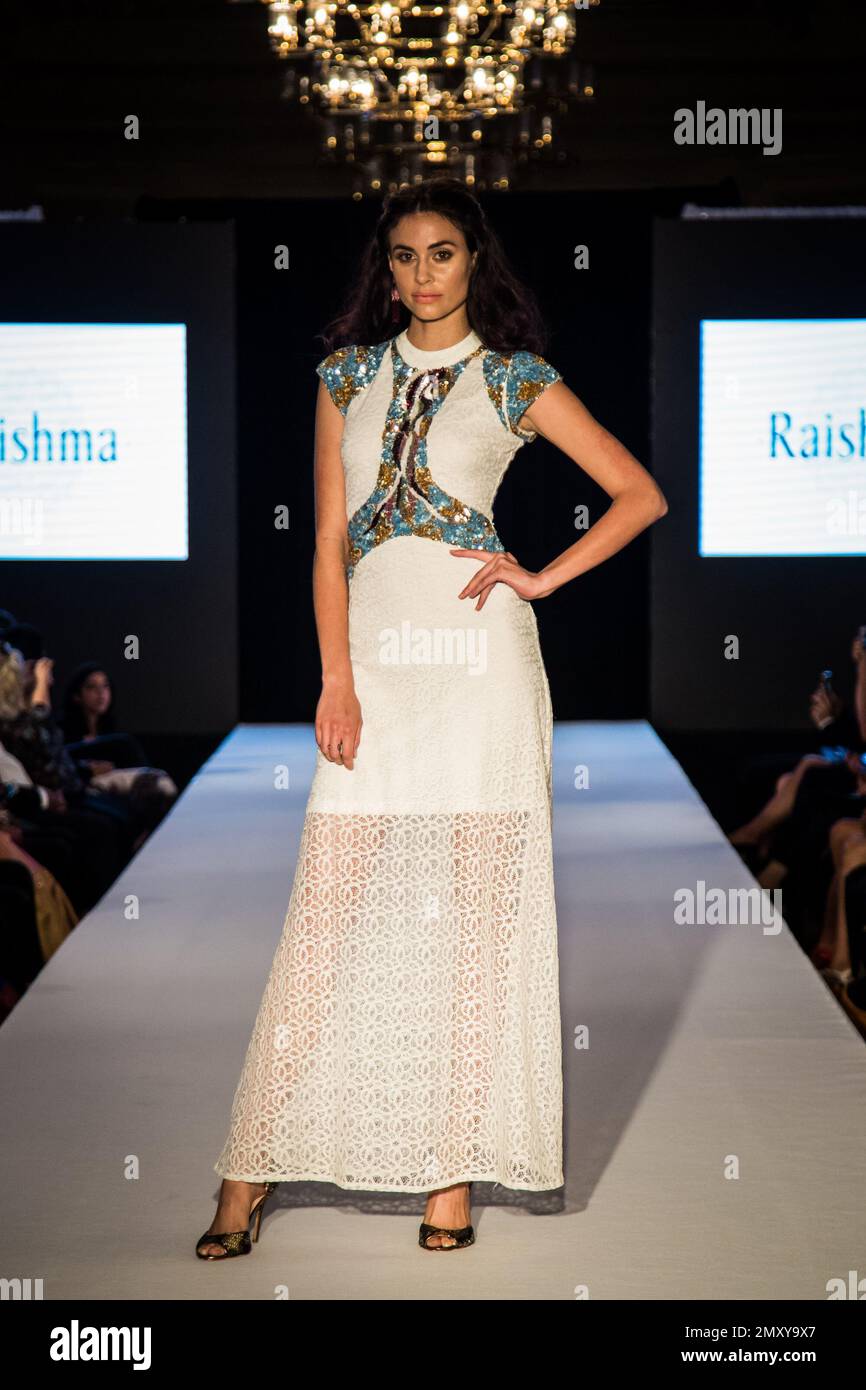 A model wears creations from fashion designers Raischma and Lucy Choi ...