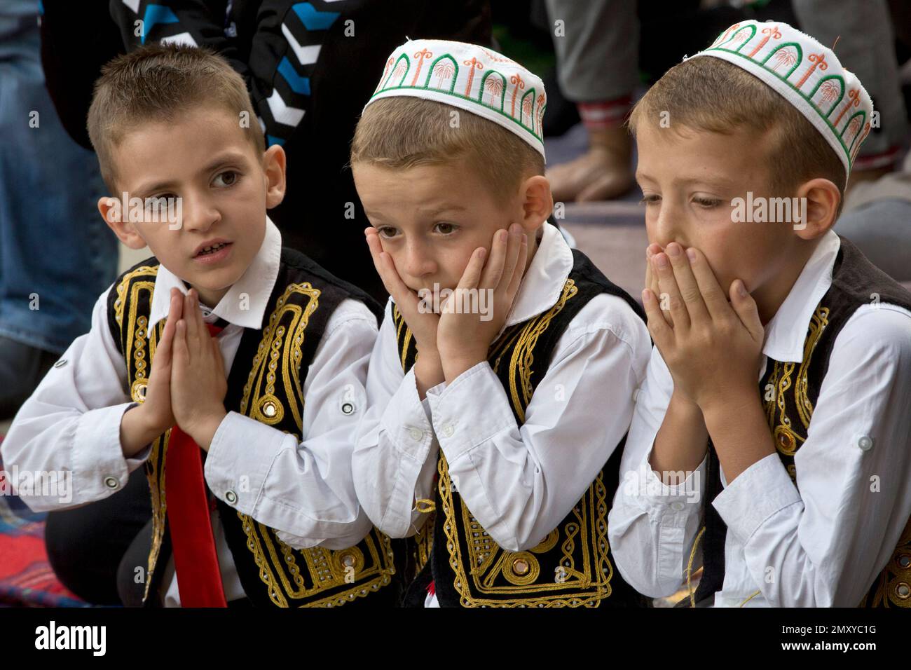 Kosovar children pray during Eid al-Adha prayers outside Sultan Mehmet Fatih mosque in capital ...