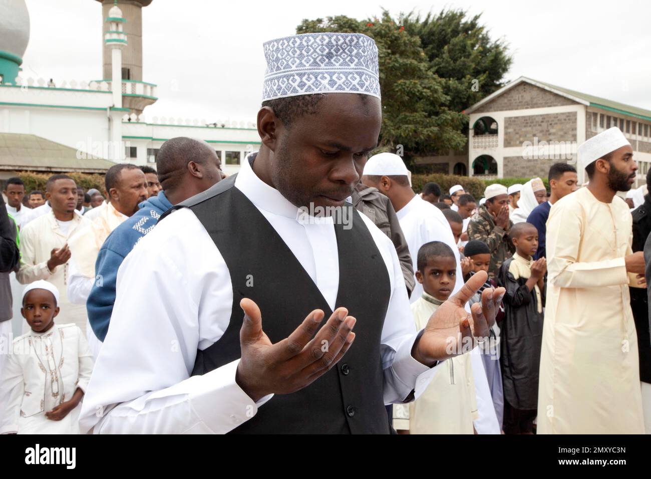 A Kenyan Muslim offers prayers to celebrate Eid al-Adha, or Feast of ...