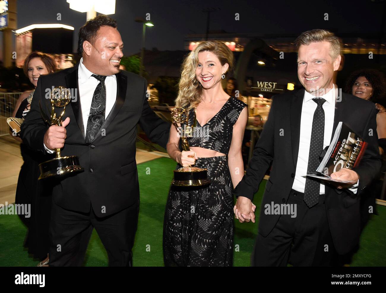 Joe Whitmeyer, from left, Cara Hannah Sullivan, and guest attend the ...