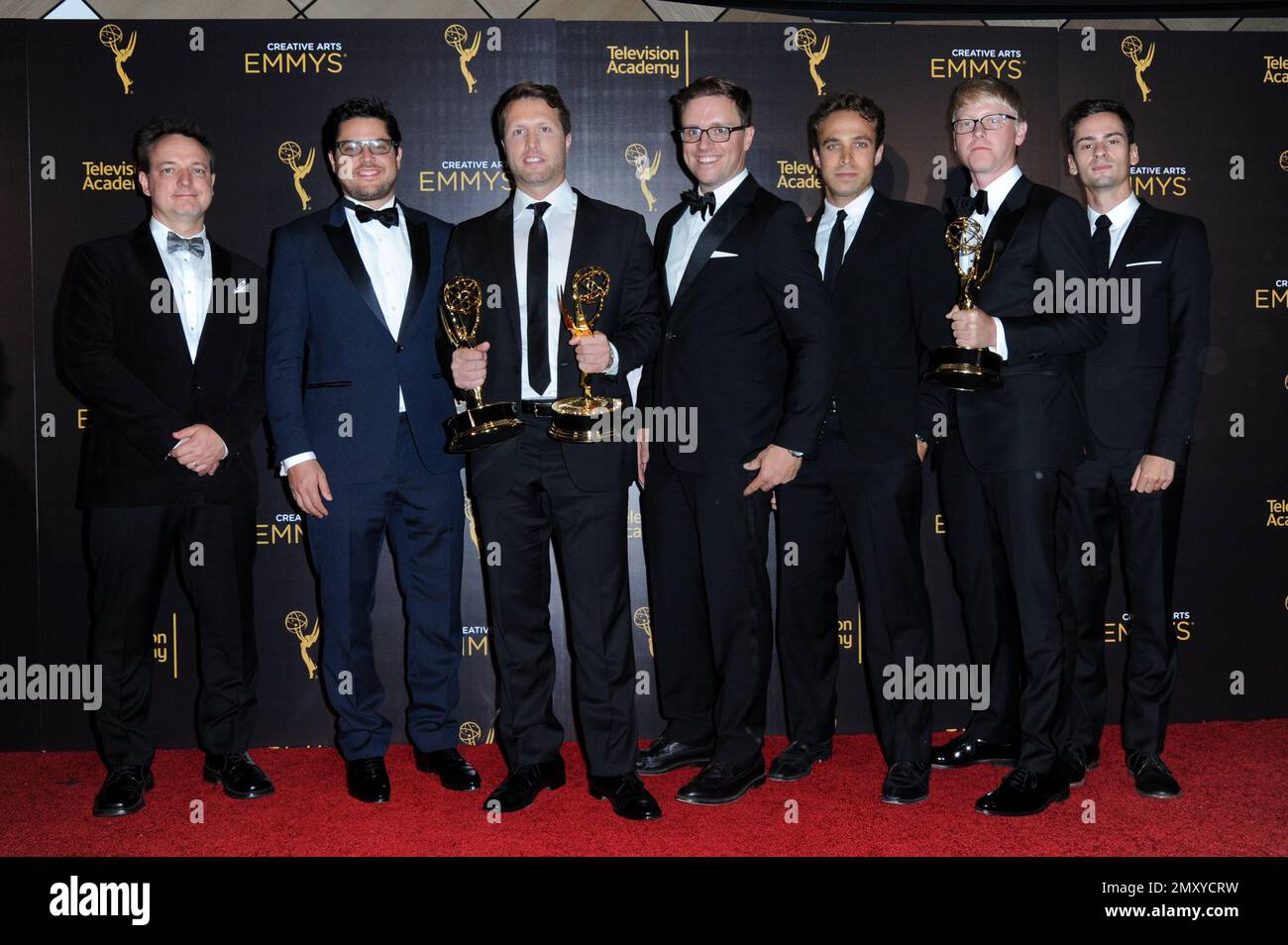 Matthew Heineman, third from left, Matt Porwoll, second from right, and ...