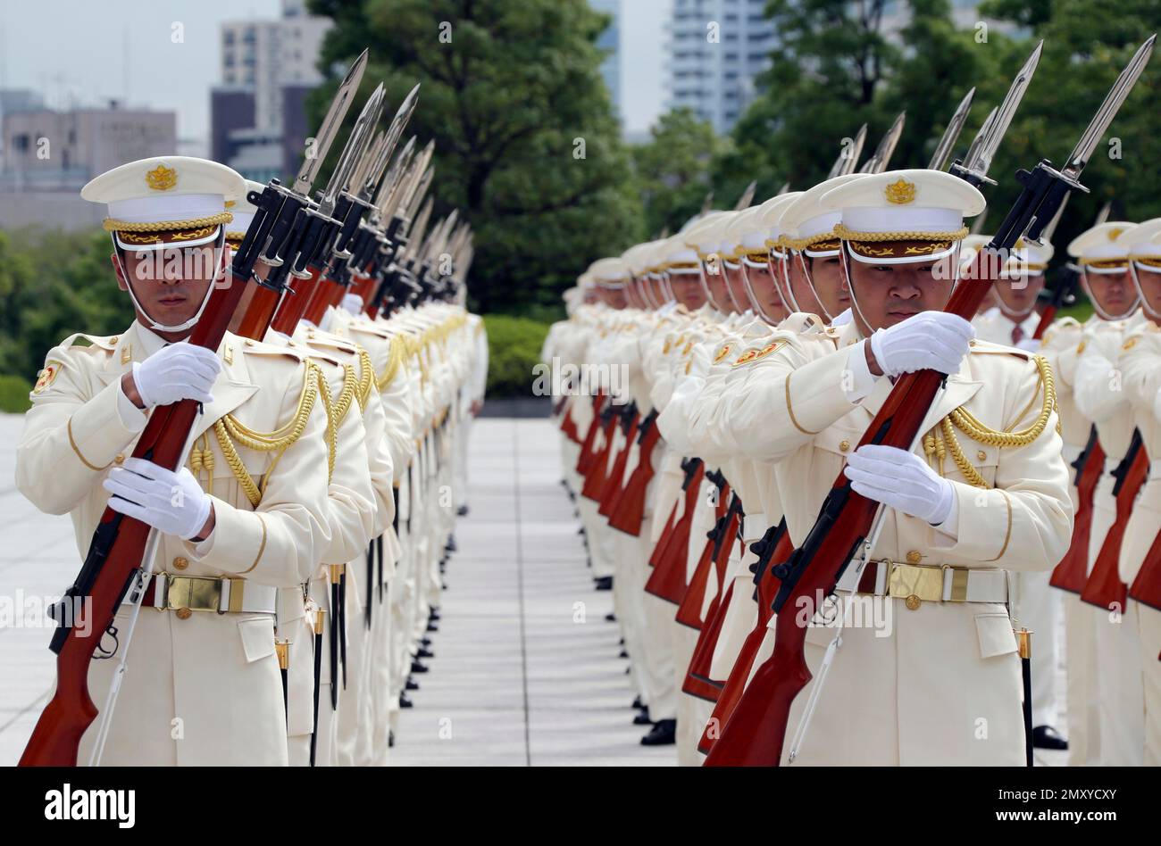 Members of an honor guard march during a preparation before Japanese ...