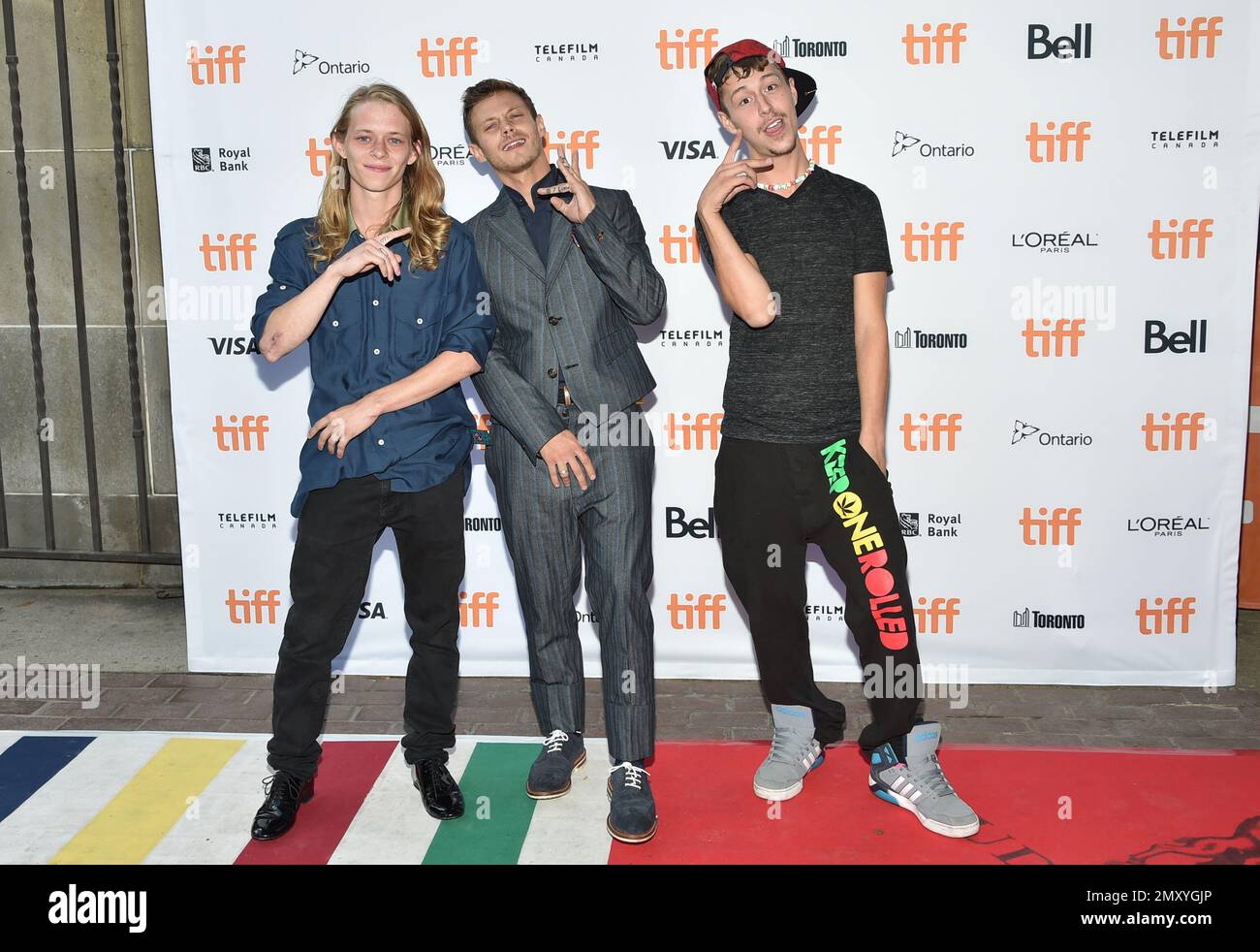 Isaiah Stone, from left, McCaul Lombardi and Raymond Coalson arrive at ...