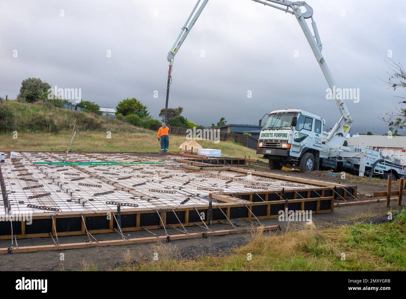 A group of construction workers developing land fields to build new ...