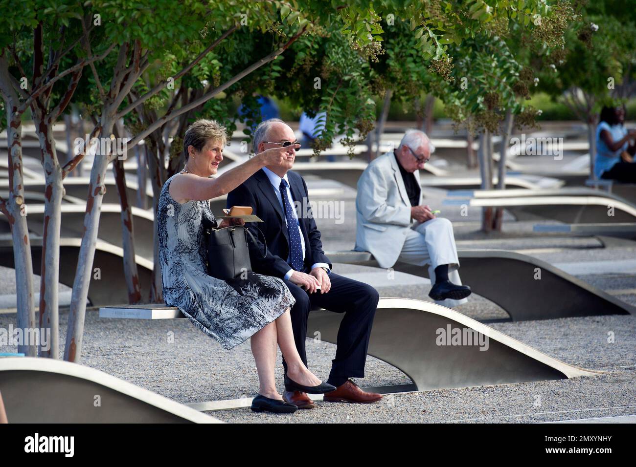 People visit the Pentagon Memorial prior to a Sept. 11 observance ...