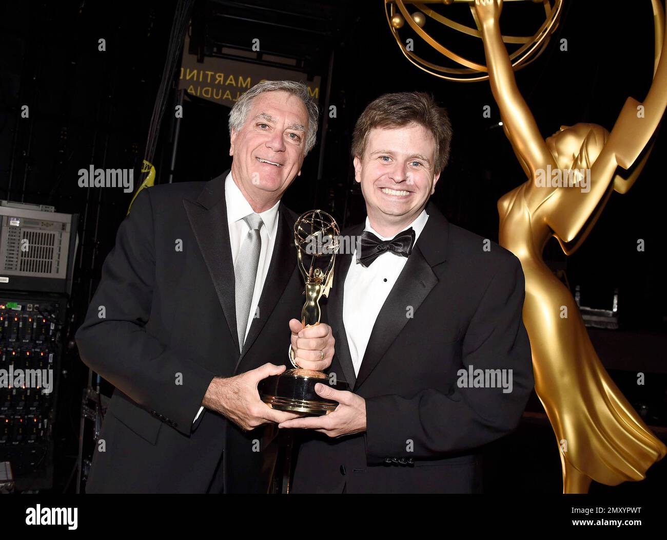 EXCLUSIVE - Paul Miller, left, and Jason Mendelson pose with the award ...
