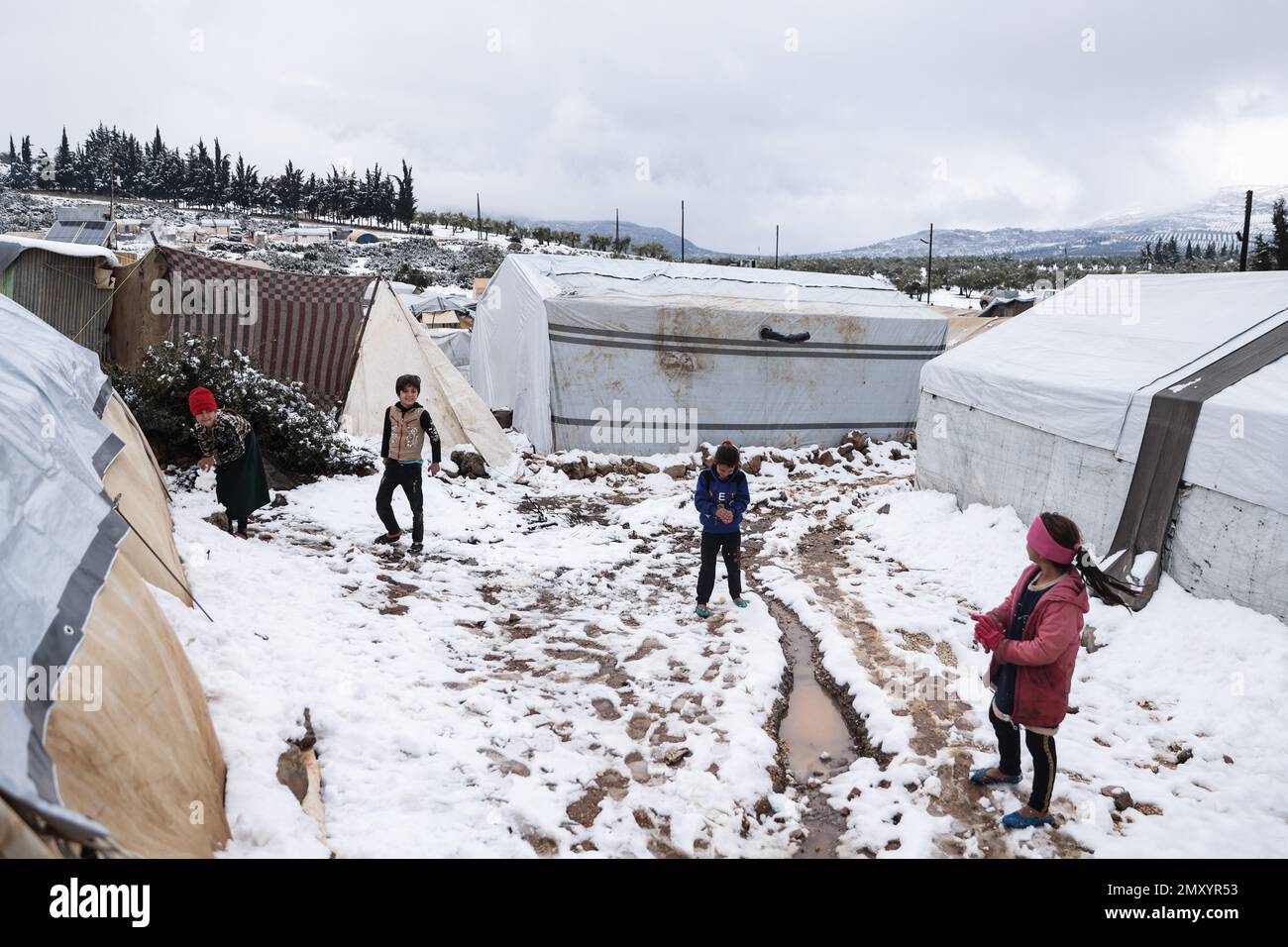 Afrin, Syria. 04th Feb, 2023. Syrian children play between tents at a ...