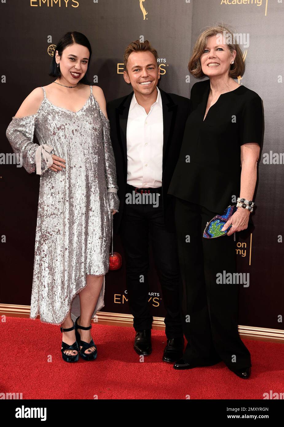 Jennifer Salim, from left, Paolo Nieddu, and Mary Lane arrive at night ...
