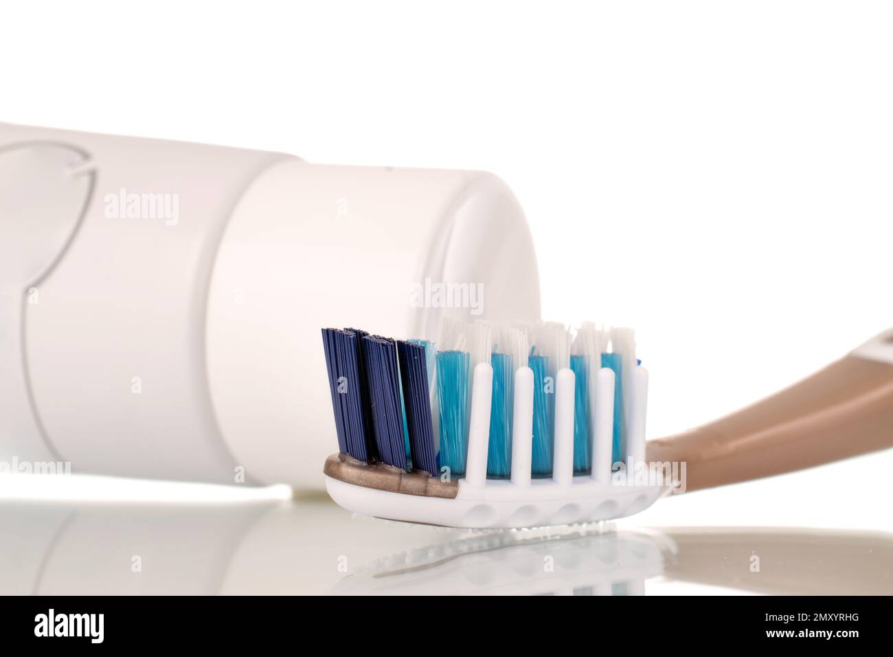 Oral care products, toothpaste and toothbrush, macro isolated on white background Stock Photo ...