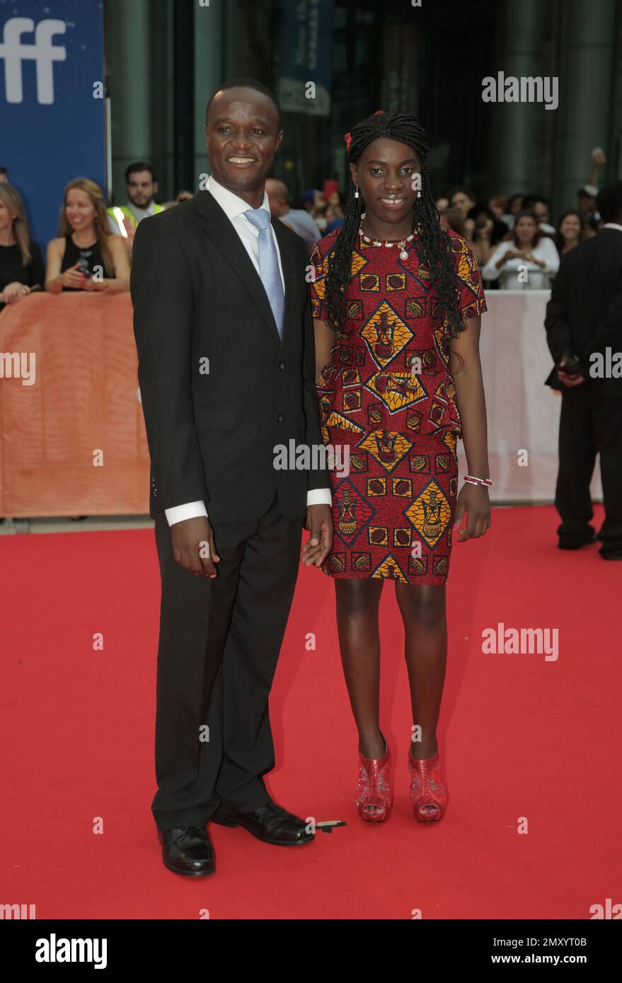 Robert Katende and Phiona Mutesi attend the “Queen of Katwe” premiere ...