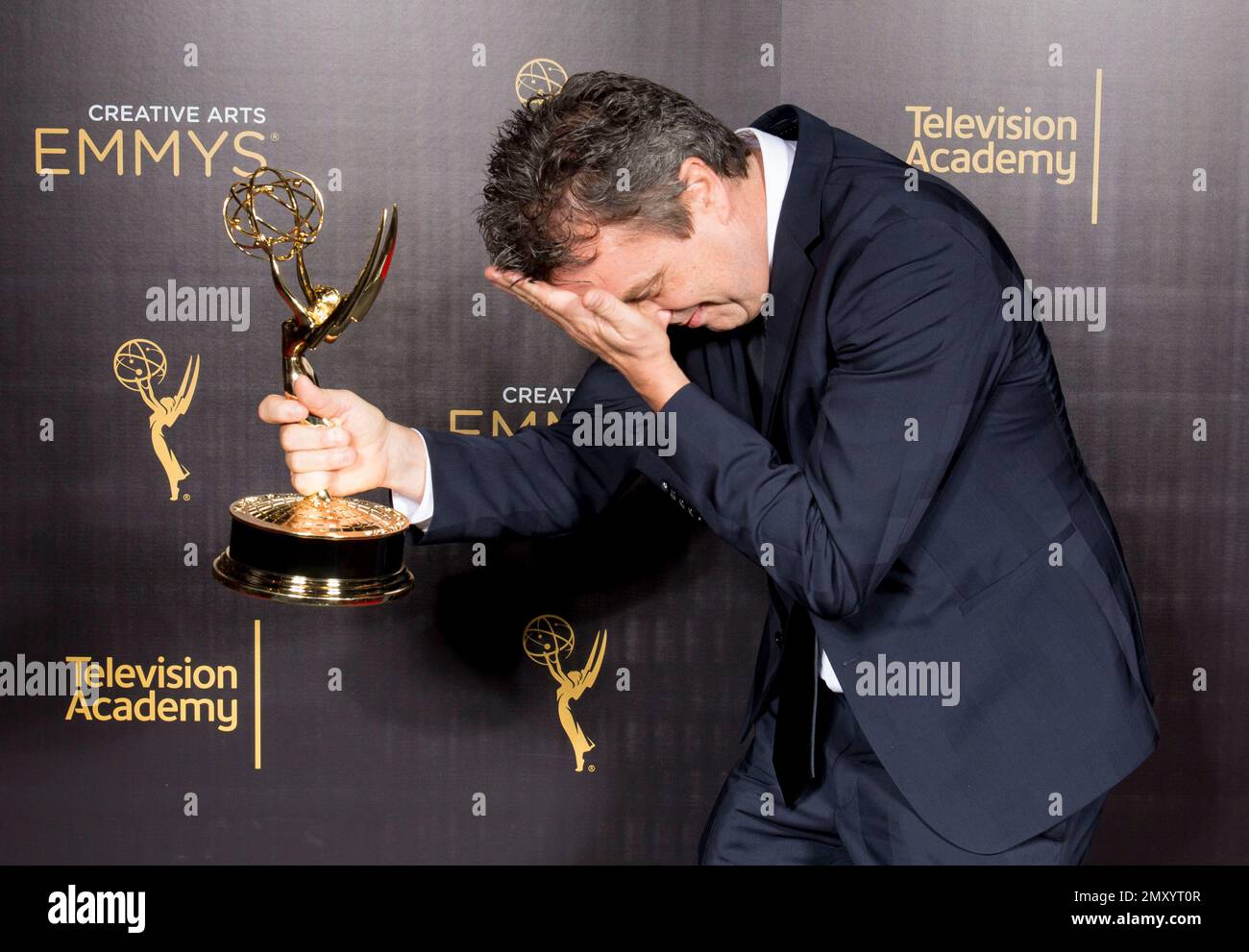 EXCLUSIVE - Sean P. Callery poses for a portrait with the award for ...