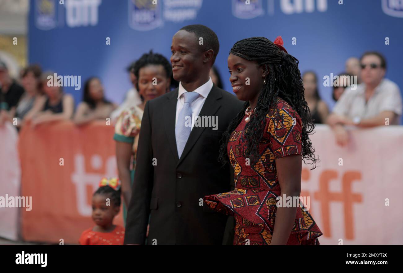 Robert Katende and Phiona Mutesi attend the “Queen of Katwe” premiere ...