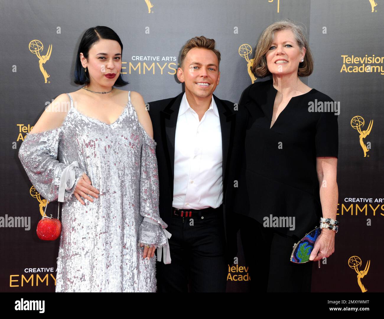 Jennifer Salim, from left, Paolo Nieddu, and Mary Lane arrive at night ...