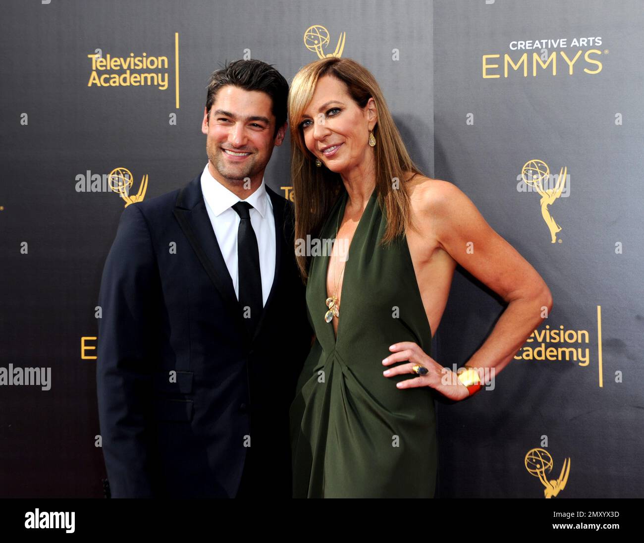 Philip Joncas, left, and Allison Janney arrives at night one of the ...