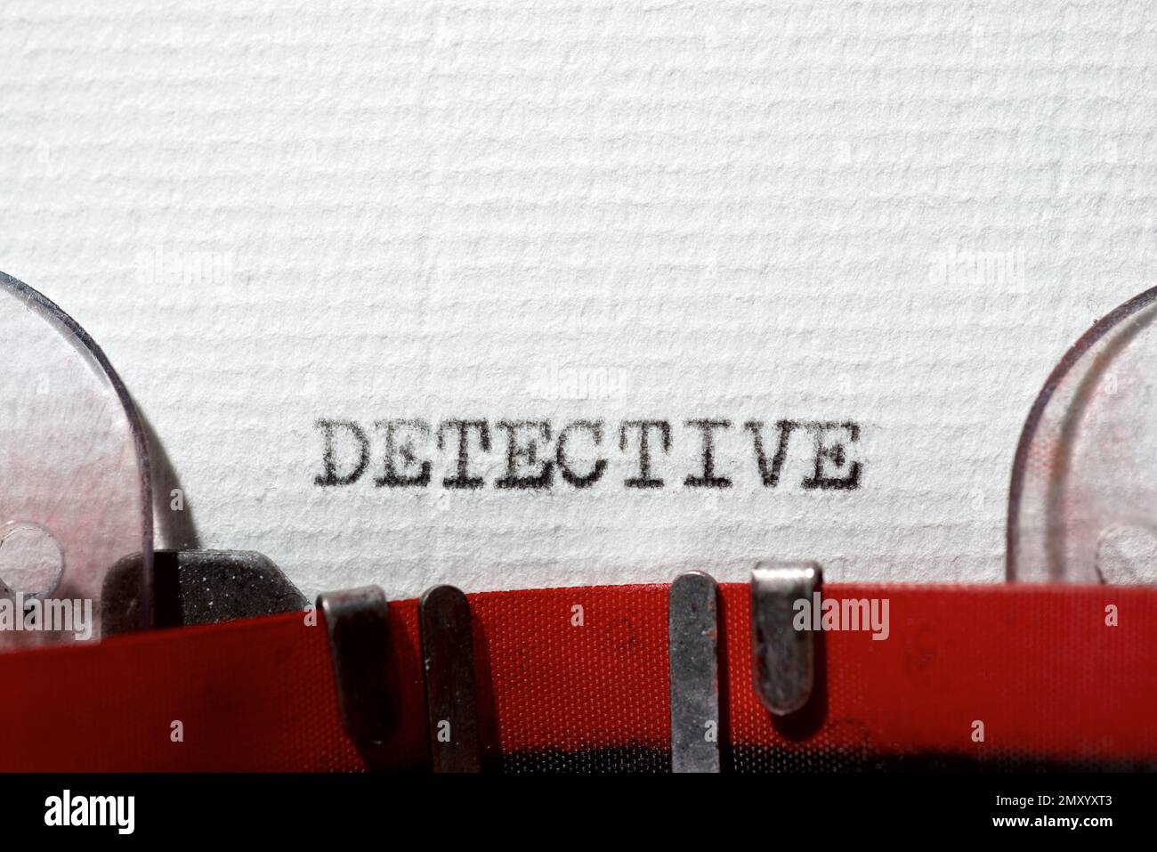 Detective word written with a typewriter Stock Photo - Alamy