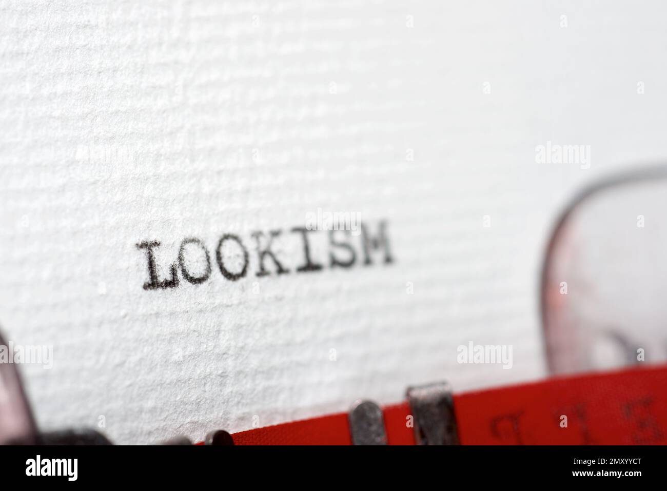 Lookism word written with a typewriter Stock Photo - Alamy