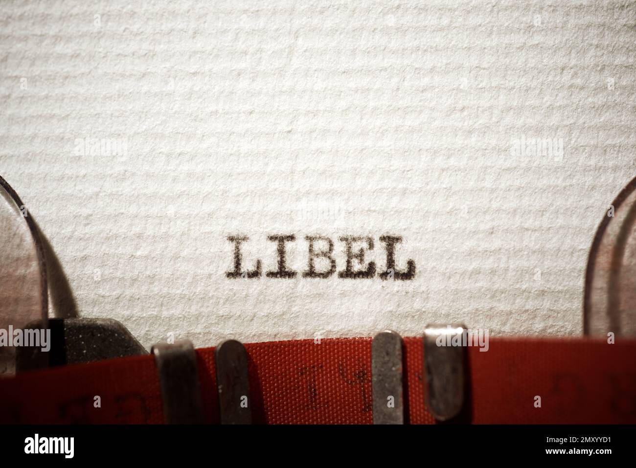 Libel word written with a typewriter Stock Photo - Alamy
