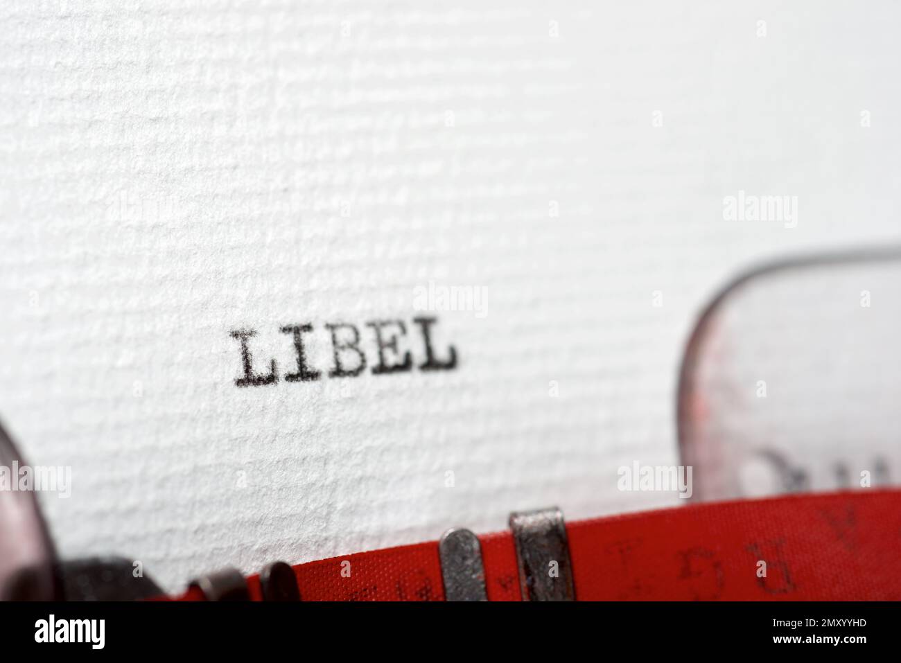 Libel word written with a typewriter Stock Photo - Alamy